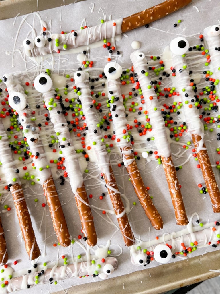 Halloween White Chocolate Mummy Pretzel Rods — Hello Adams Family